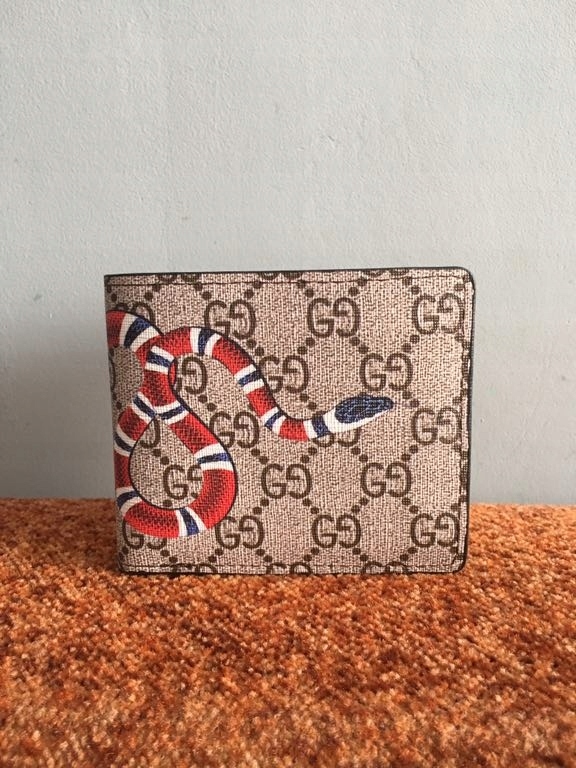 Portfel Gucci Snake GG Supreme NOWY - 7514949957 - oficjalne archiwum ...